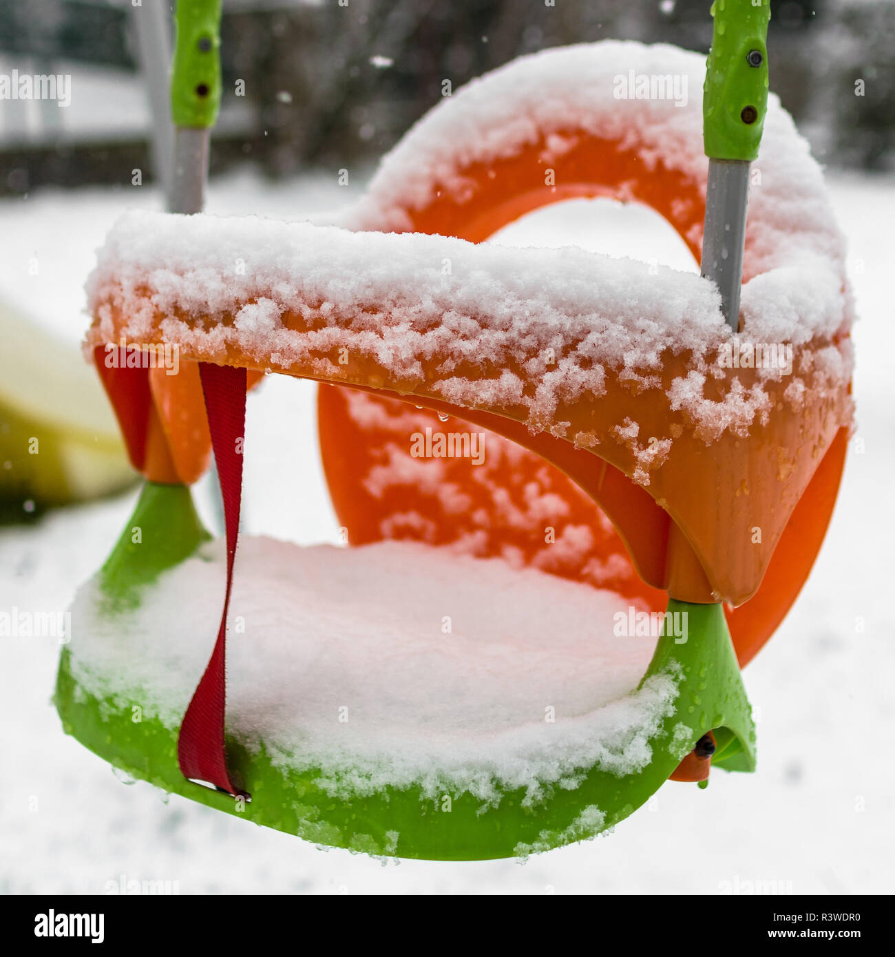 Swing in winter Stock Photo - Alamy