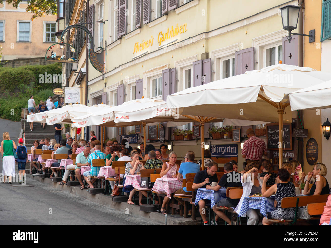 People dining at outdoor restaurant, Bamberg (UNESCO World Heritage ...