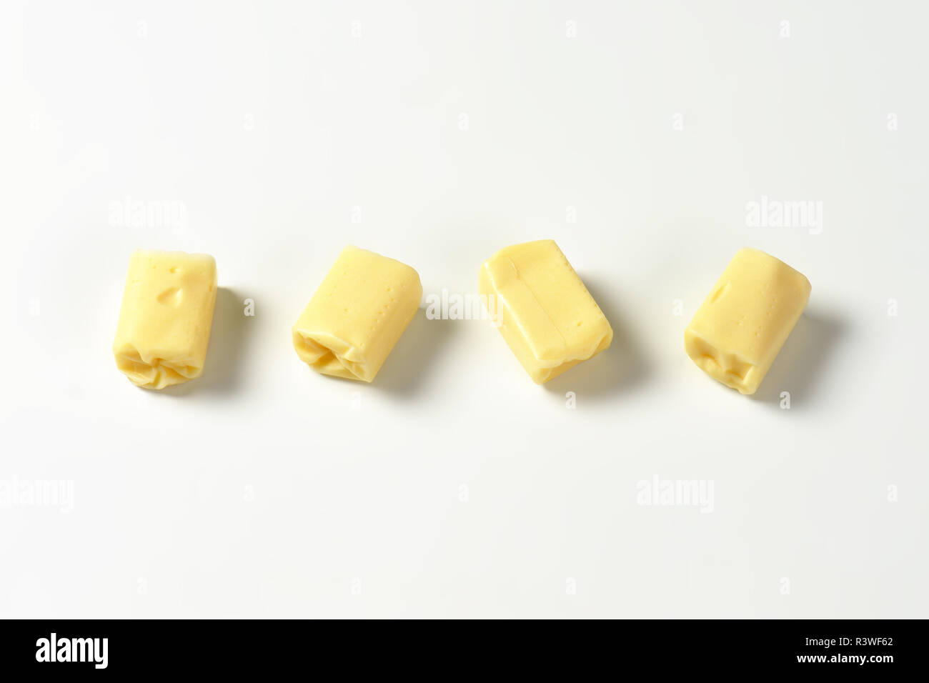 White chewy candies Stock Photo - Alamy