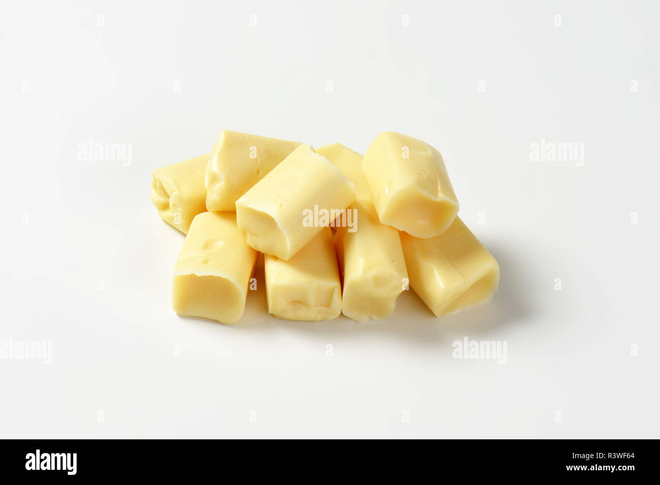 White chewy candies Stock Photo - Alamy