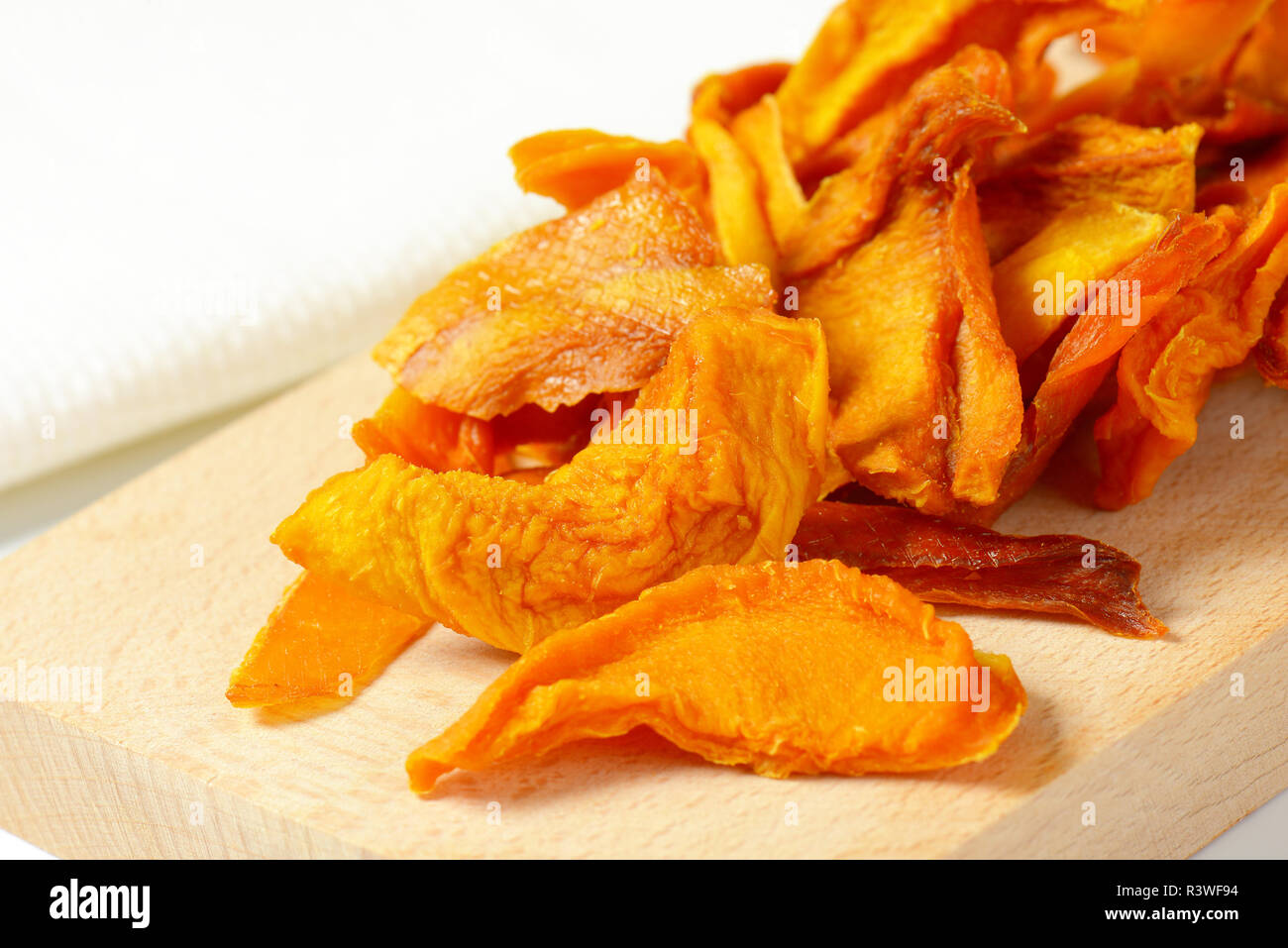 Dried mango slices Stock Photo - Alamy