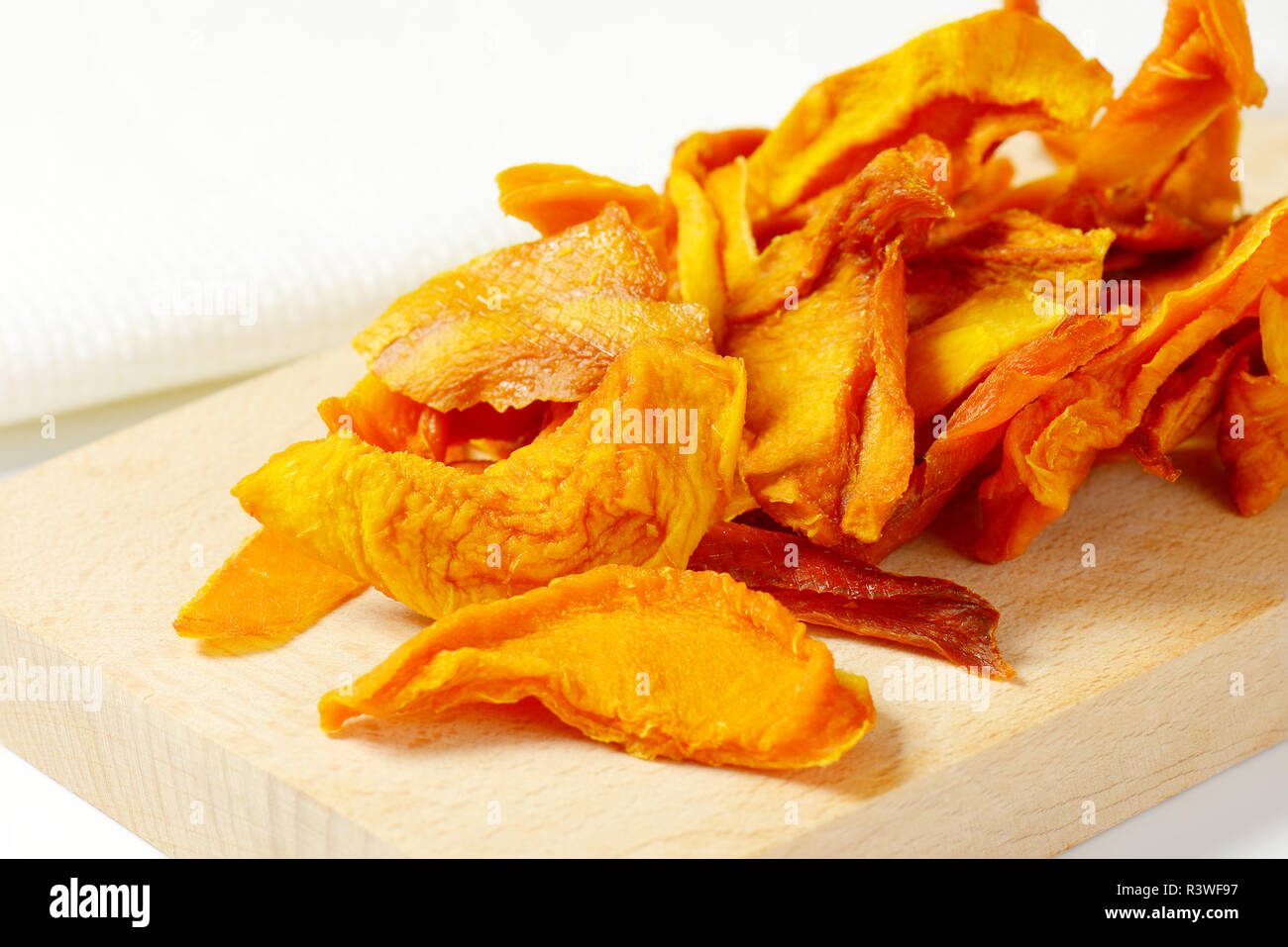 Dried mango slices Stock Photo - Alamy