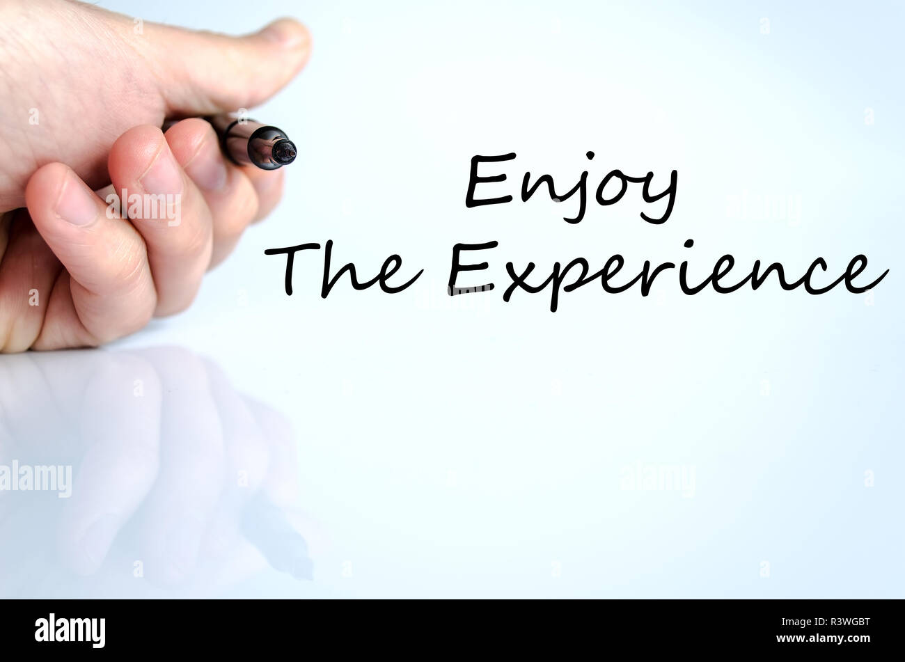 Enjoy the experience text concept Stock Photo - Alamy