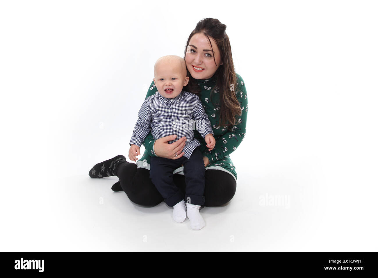 New parents sitting newborn baby hi-res stock photography and images ...