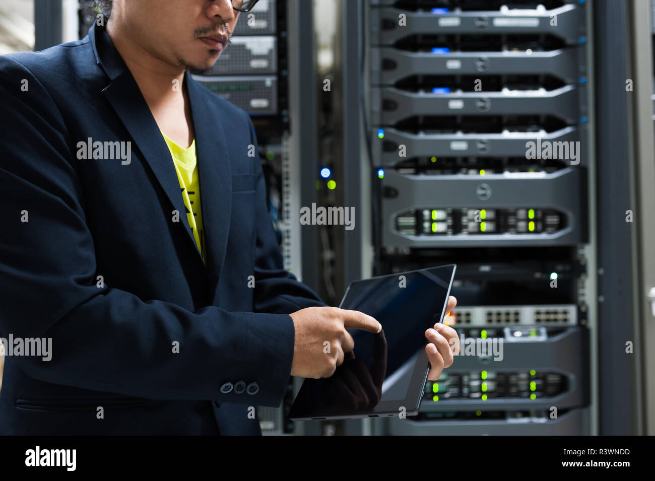 Technician works in computer server hi-res stock photography and images ...