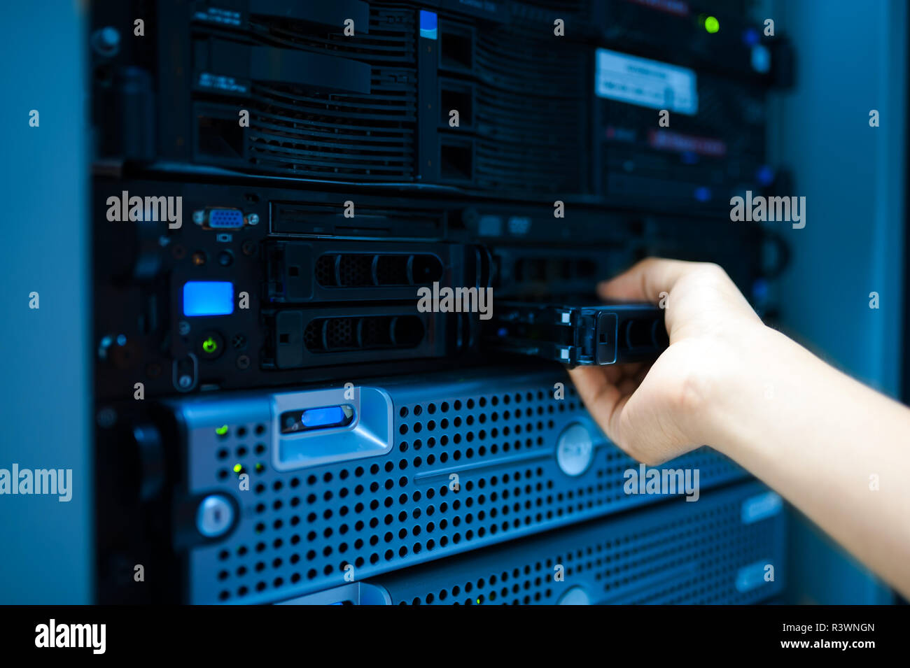 Man fix server network in data center room Stock Photo - Alamy