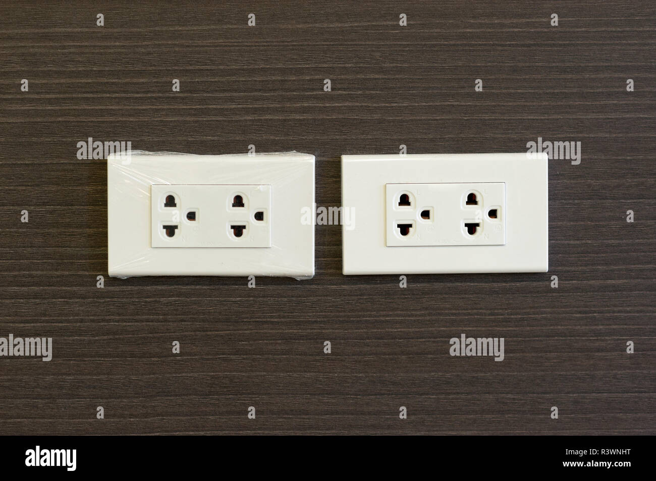 Plug socket in modern place Stock Photo - Alamy