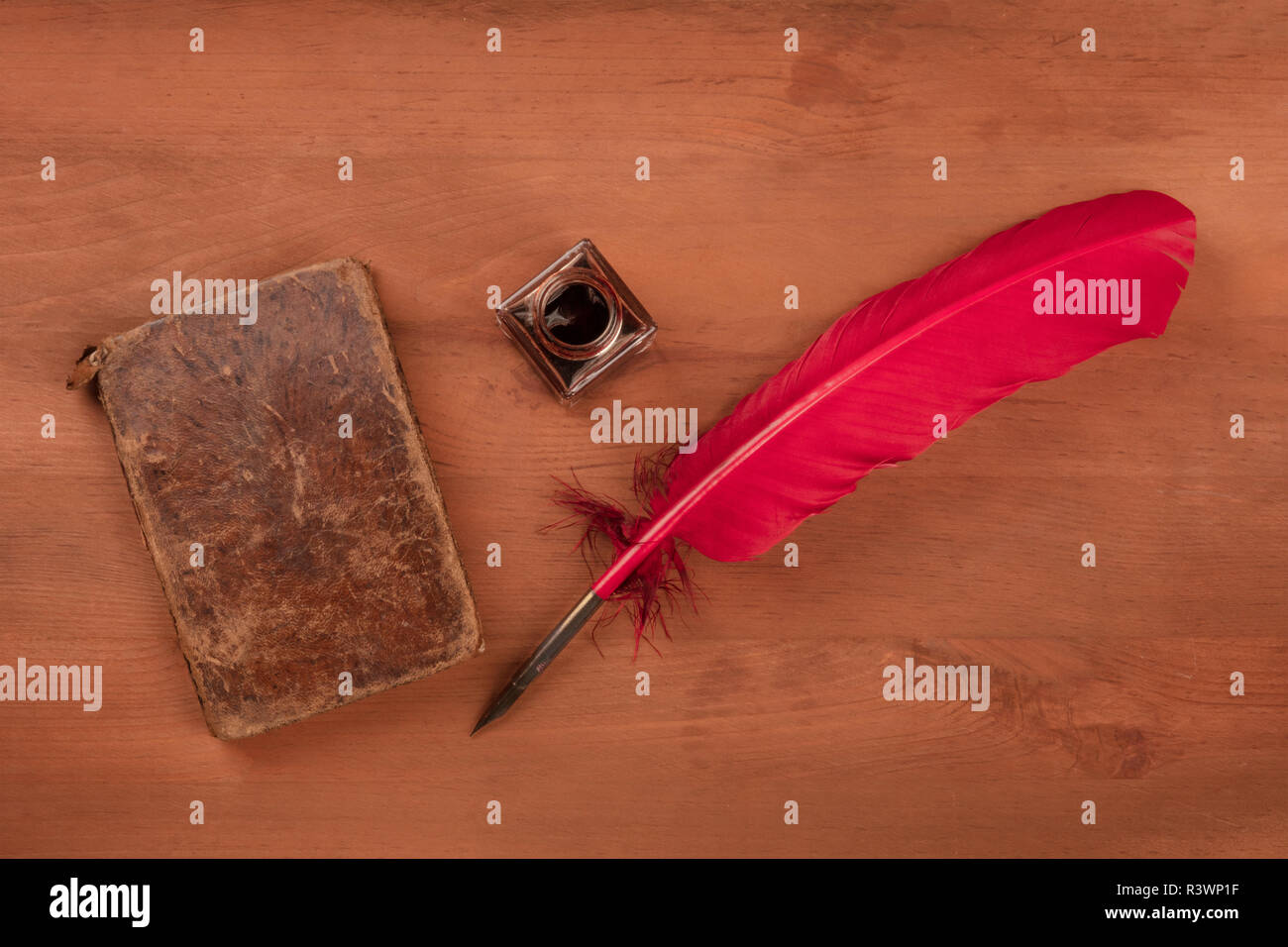 Writing Poetry. A photo of a red quill with and ink well and an old ...