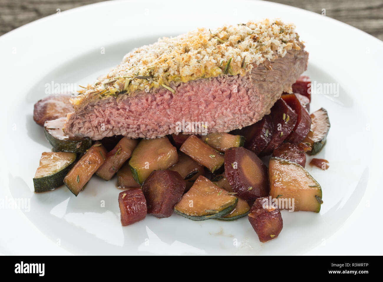 pink lamb with herb crust Stock Photo - Alamy