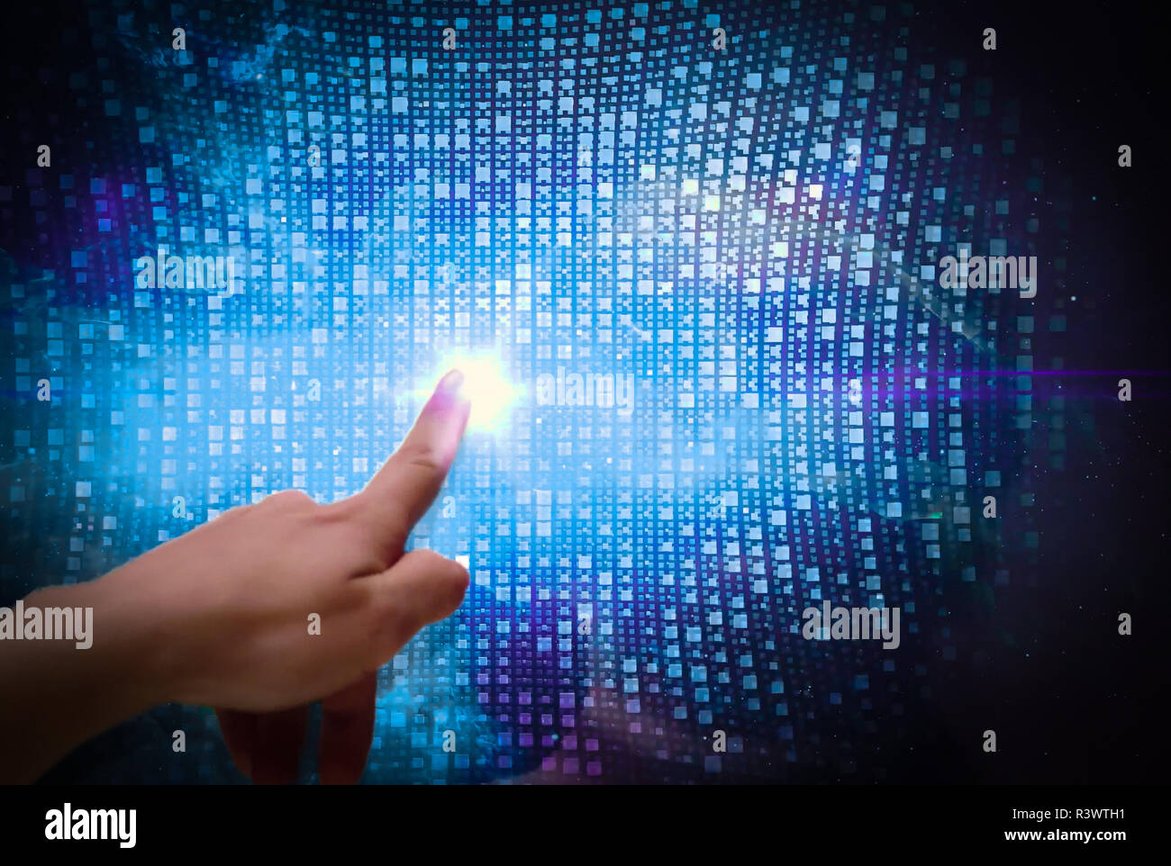 Index finger touches a touch screen and creates light and space effects ...