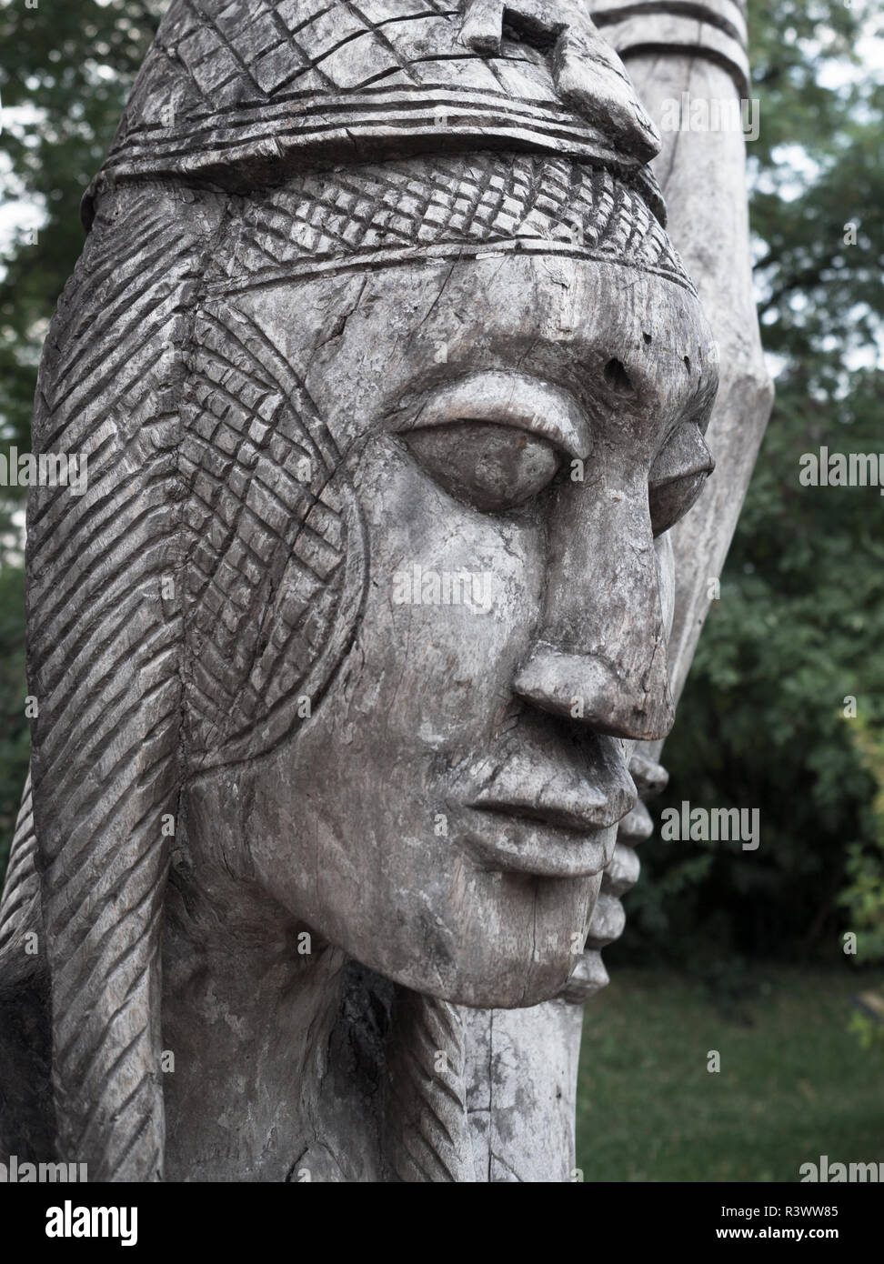 A traditional wooden African tribal statues in a public park Stock ...