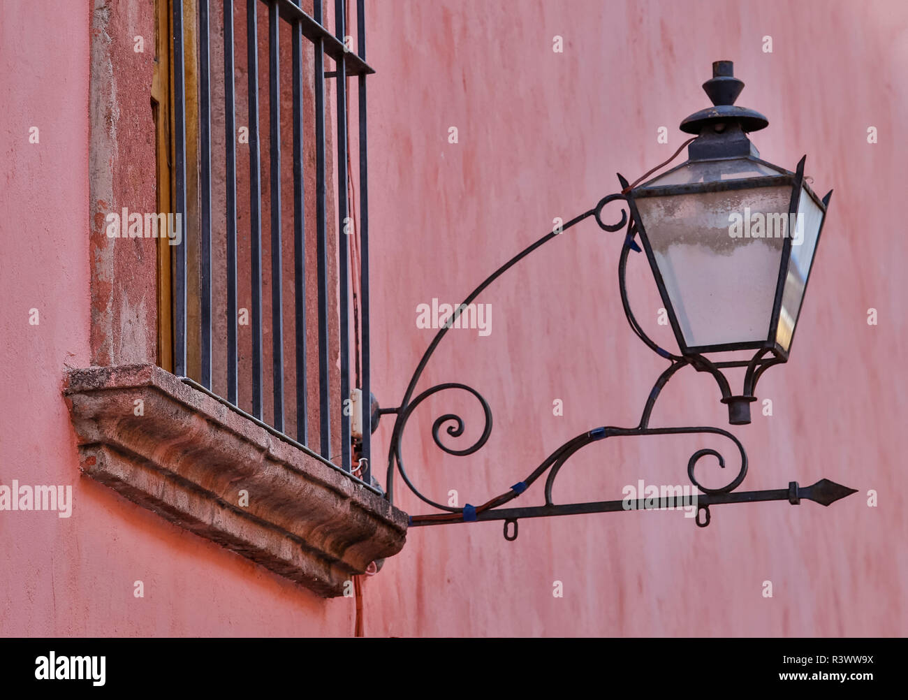 San Miguel De Allende, Mexico. Lantern and shadow on colorful buildings ...