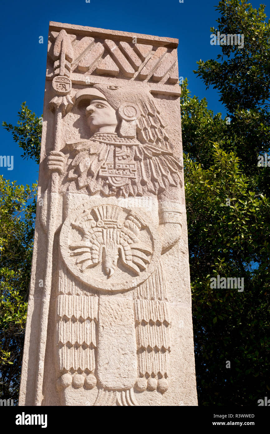 Mexico, Baja California Sur, La Paz. Stone carving of an Aztec warrior ...