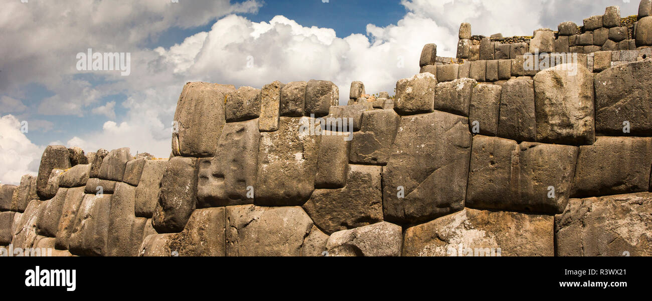 Saqsaywaman, Cusco, Peru. An Inca wall of giant stones placed together ...