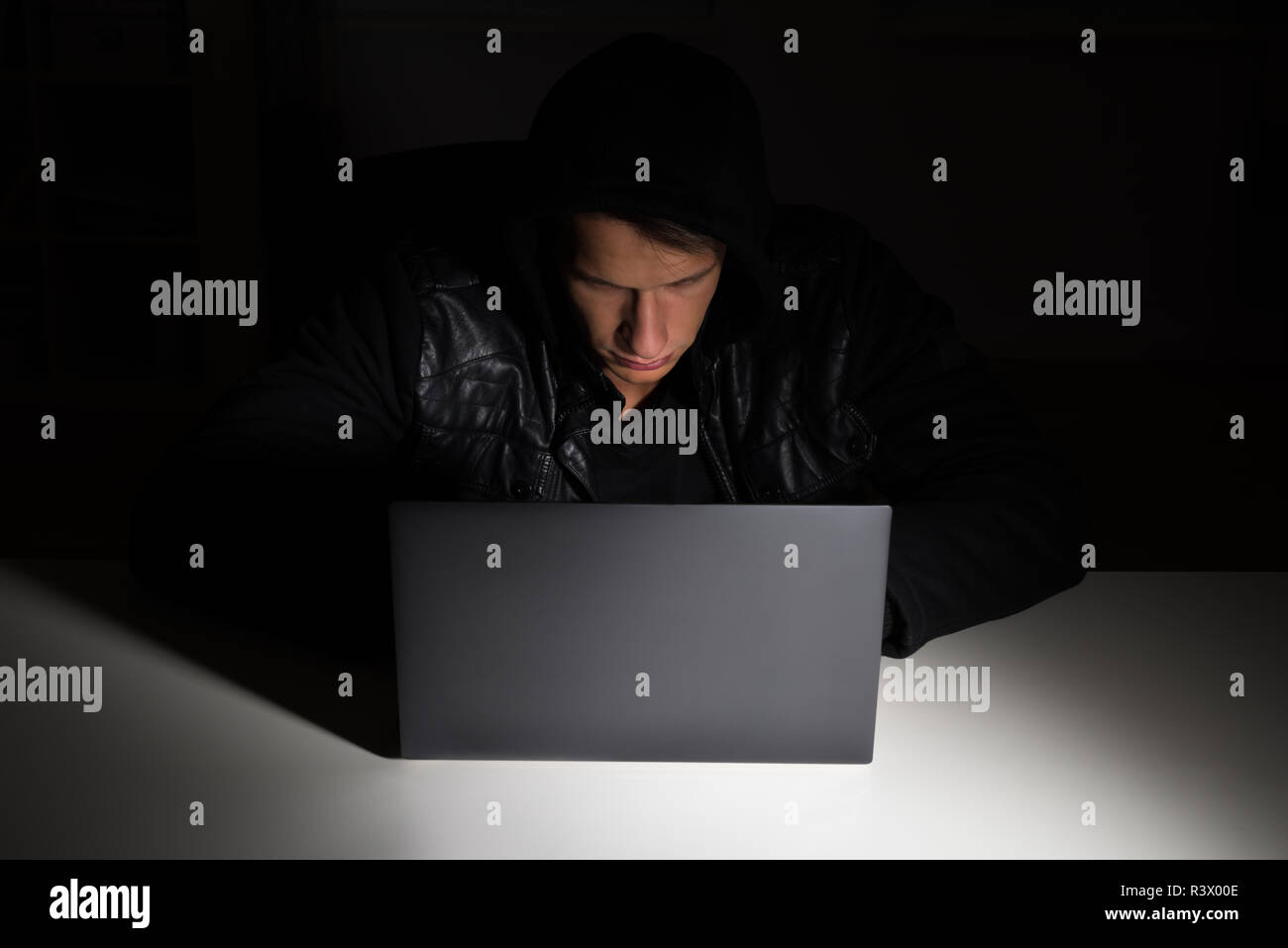 Hacker Stealing Data From Laptop Stock Photo - Alamy