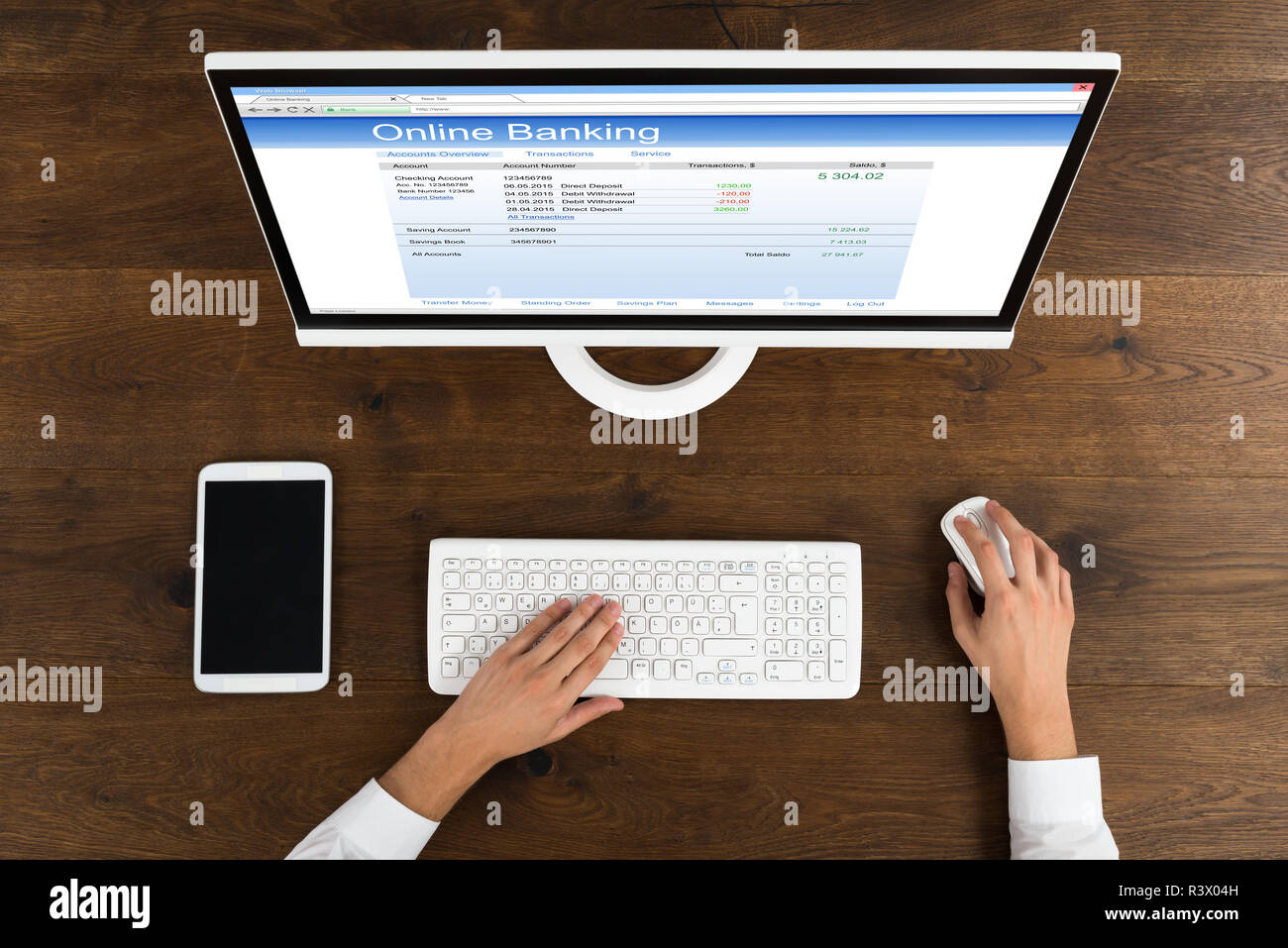 Businessperson Online Banking On Computer Stock Photo - Alamy