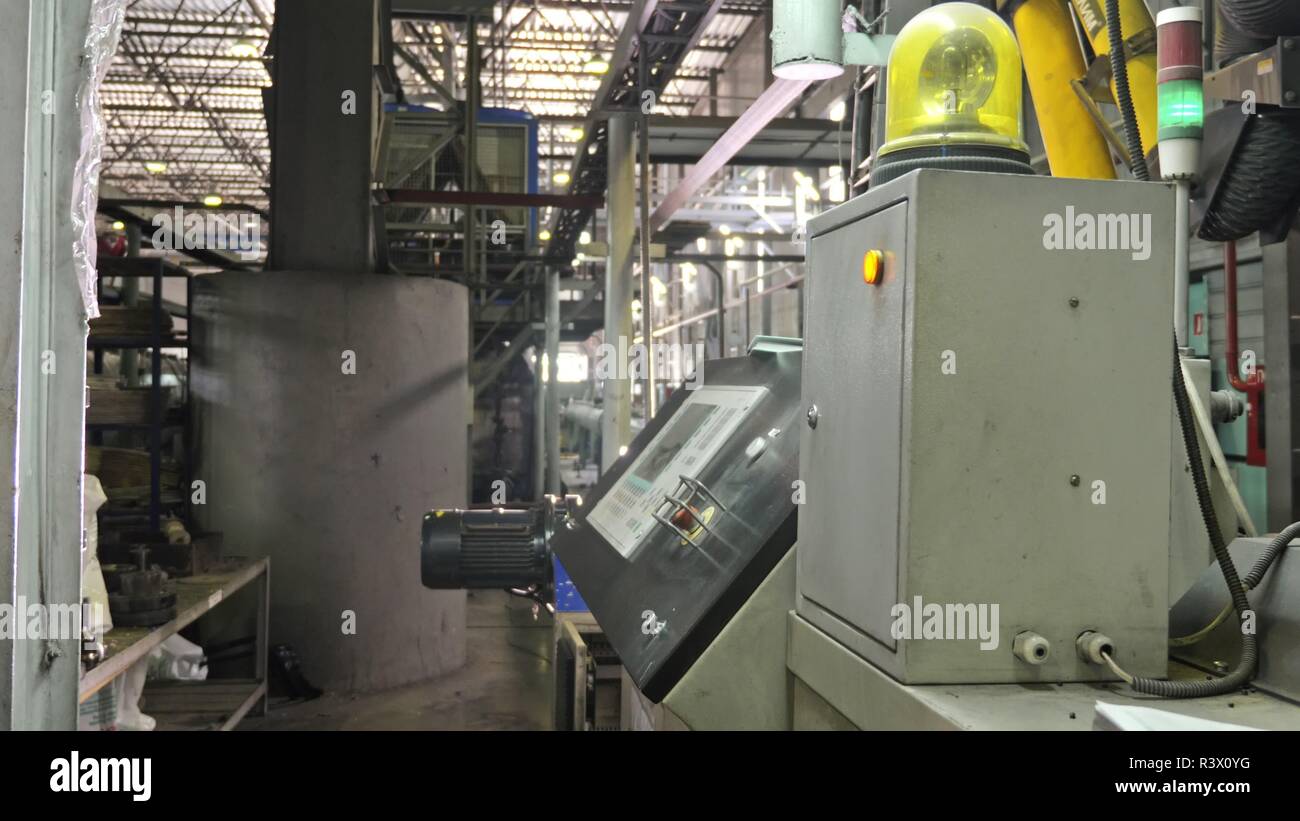 Control panel for the production line. Manufacture of plastic water ...