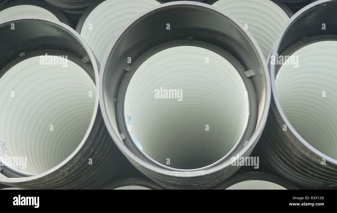 Warehouse of finished plastic pipes industrial outdoors storage site ...