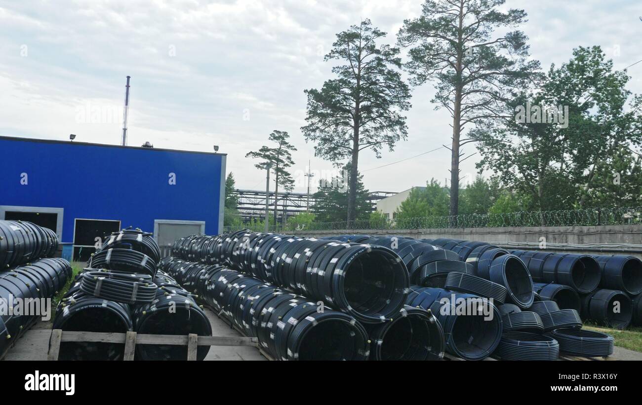 Warehouse of finished plastic pipes industrial outdoors storage site ...