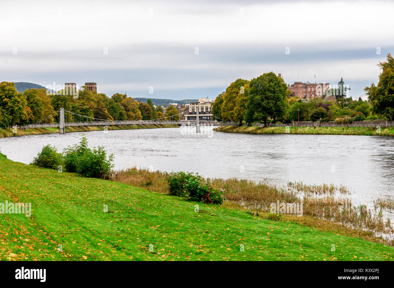 A view to river Ness, Infirmary bridge, Inverness Castle and towers of ...