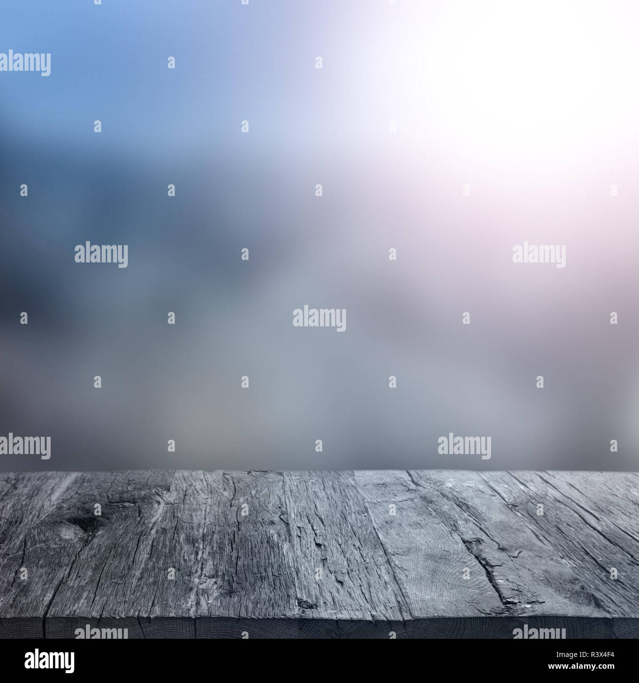 wooden table with winter background Stock Photo - Alamy