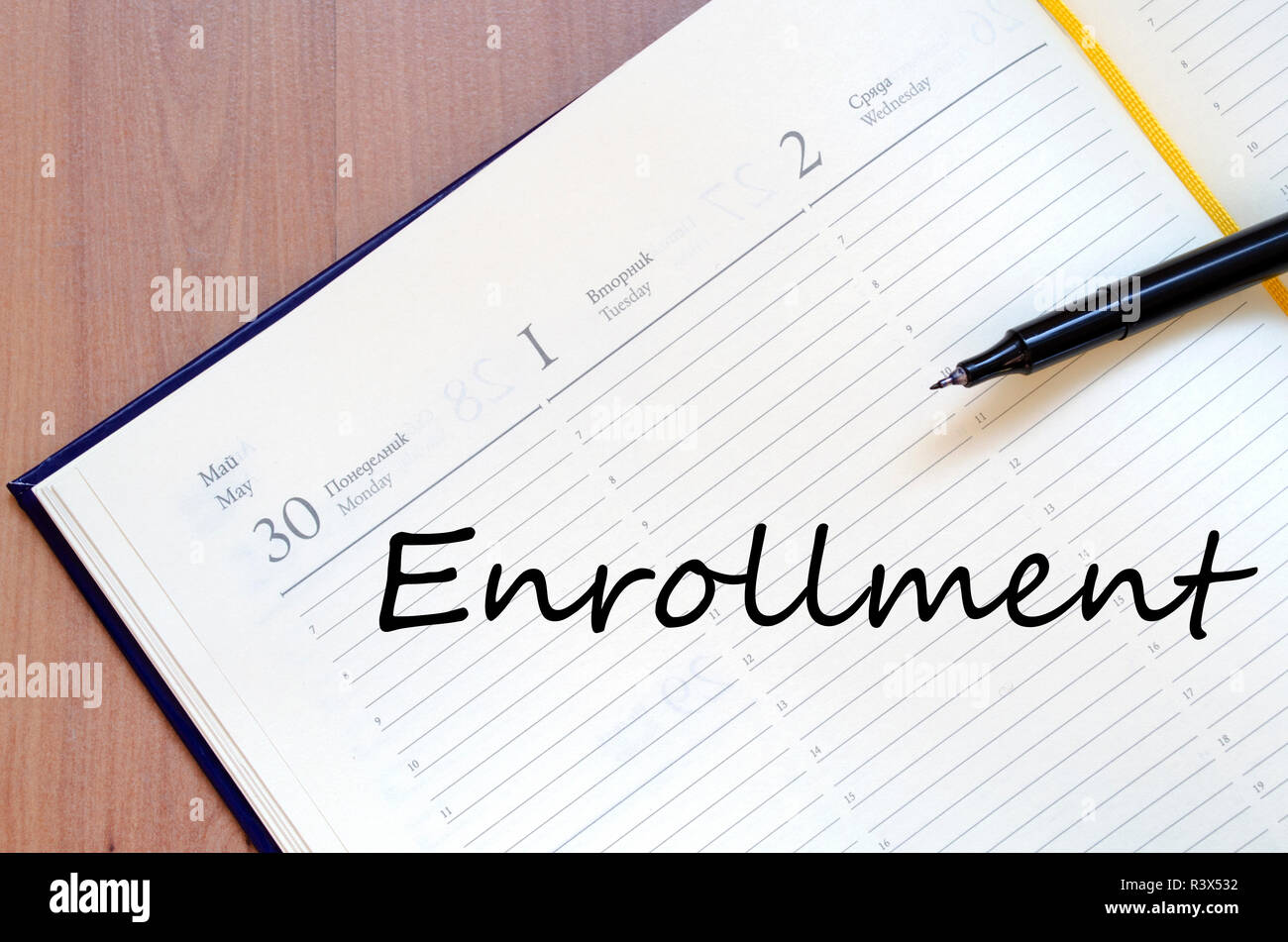 Enrollment text concept Stock Photo - Alamy