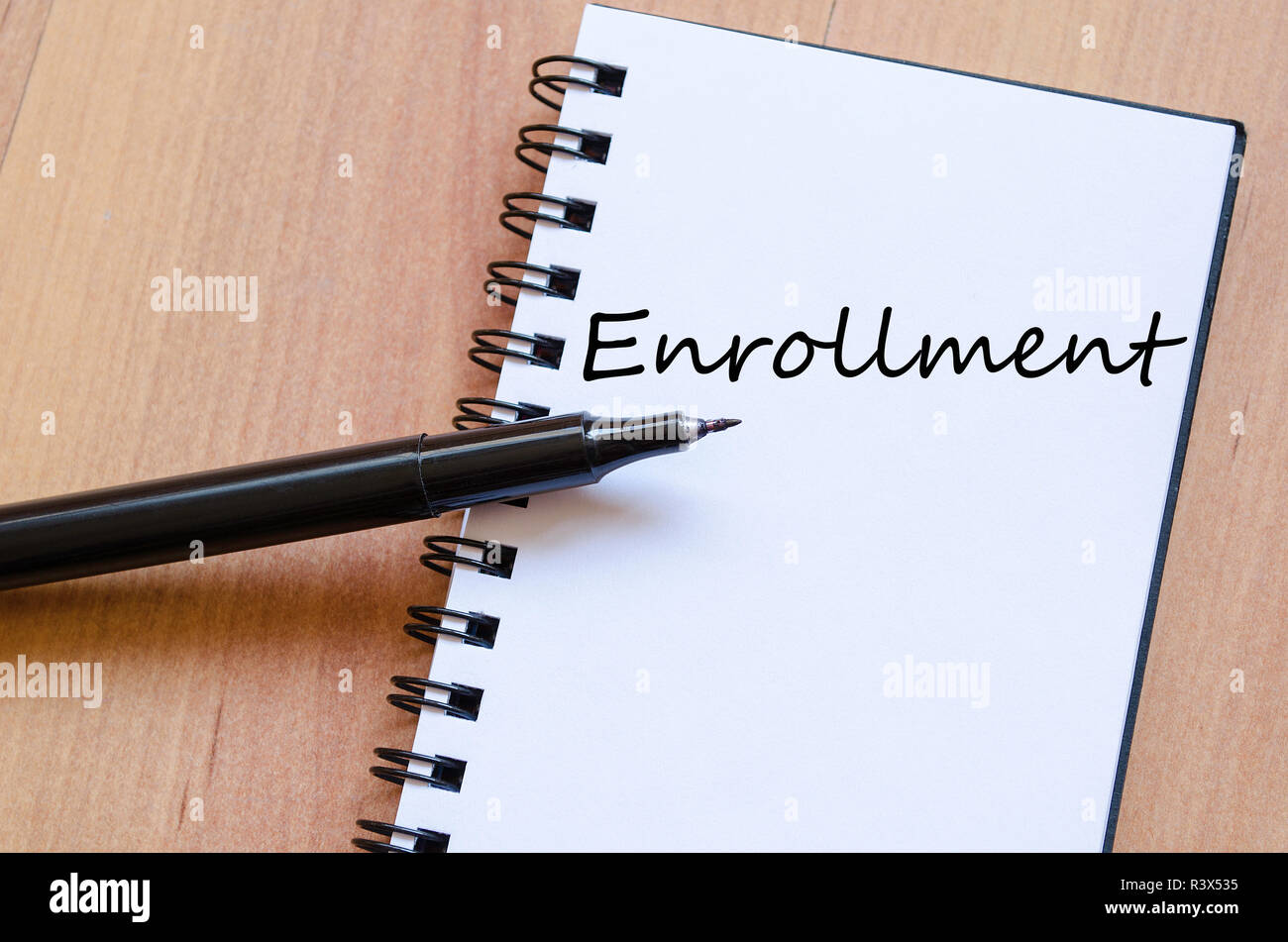 Enrollment text concept Stock Photo - Alamy