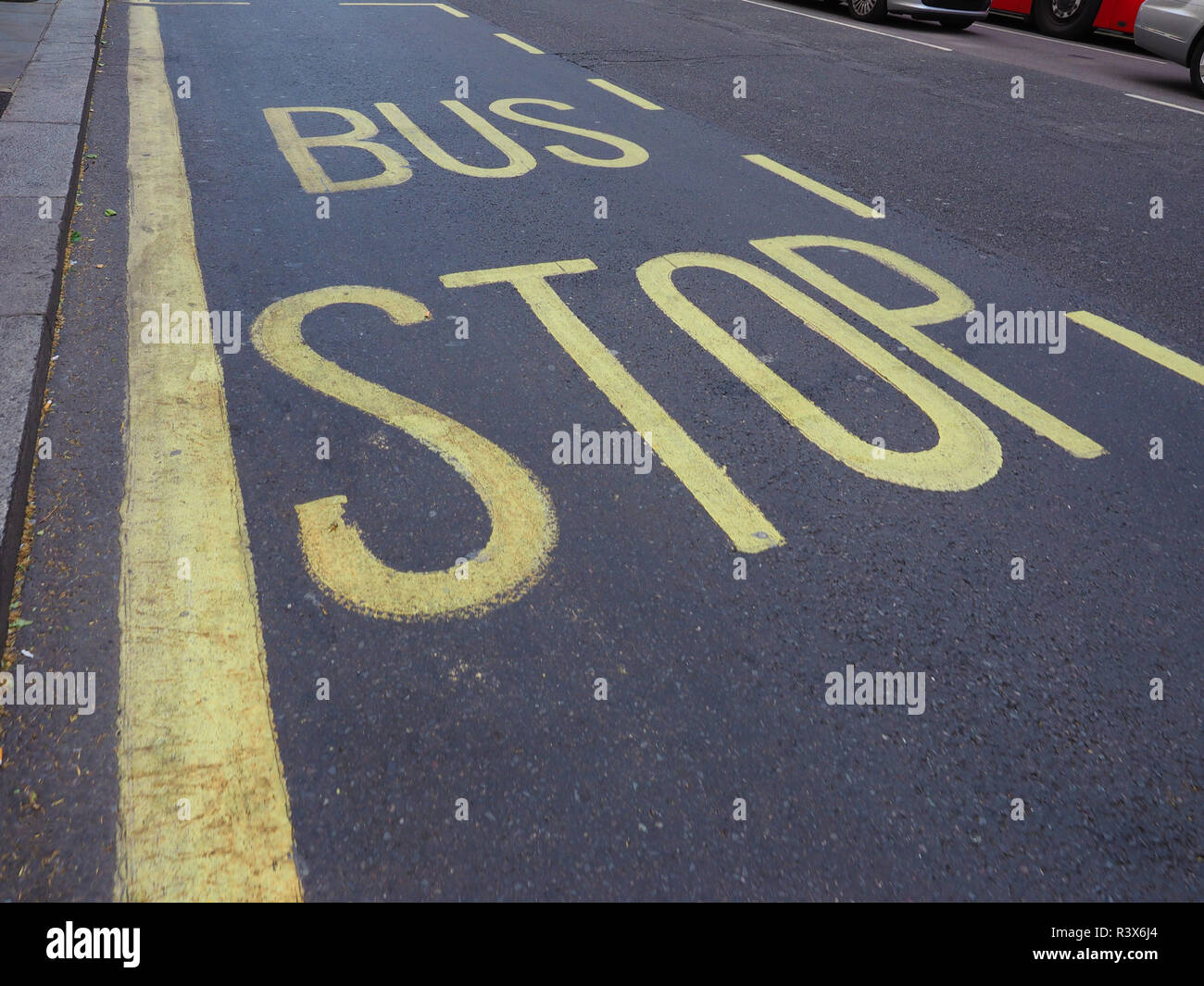 Bus stop sign Stock Photo - Alamy