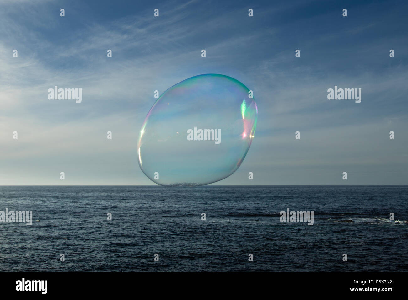 USA, California, La Jolla. Floating bubble and ocean. Credit as ...