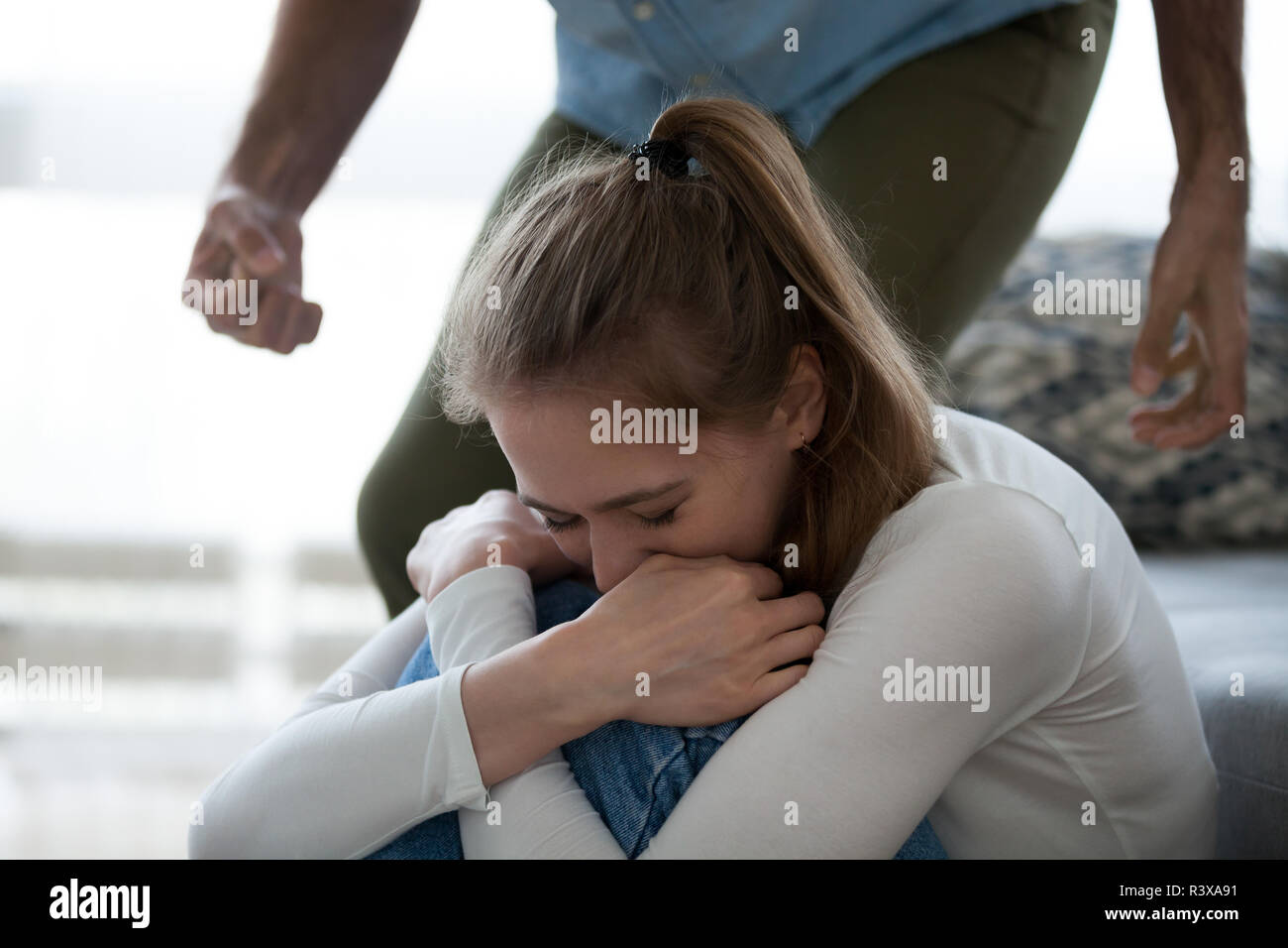 Scared woman crying afraid of domestic violence Stock Photo - Alamy