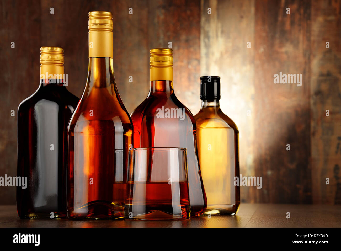 Bottles of assorted alcoholic beverages Stock Photo - Alamy