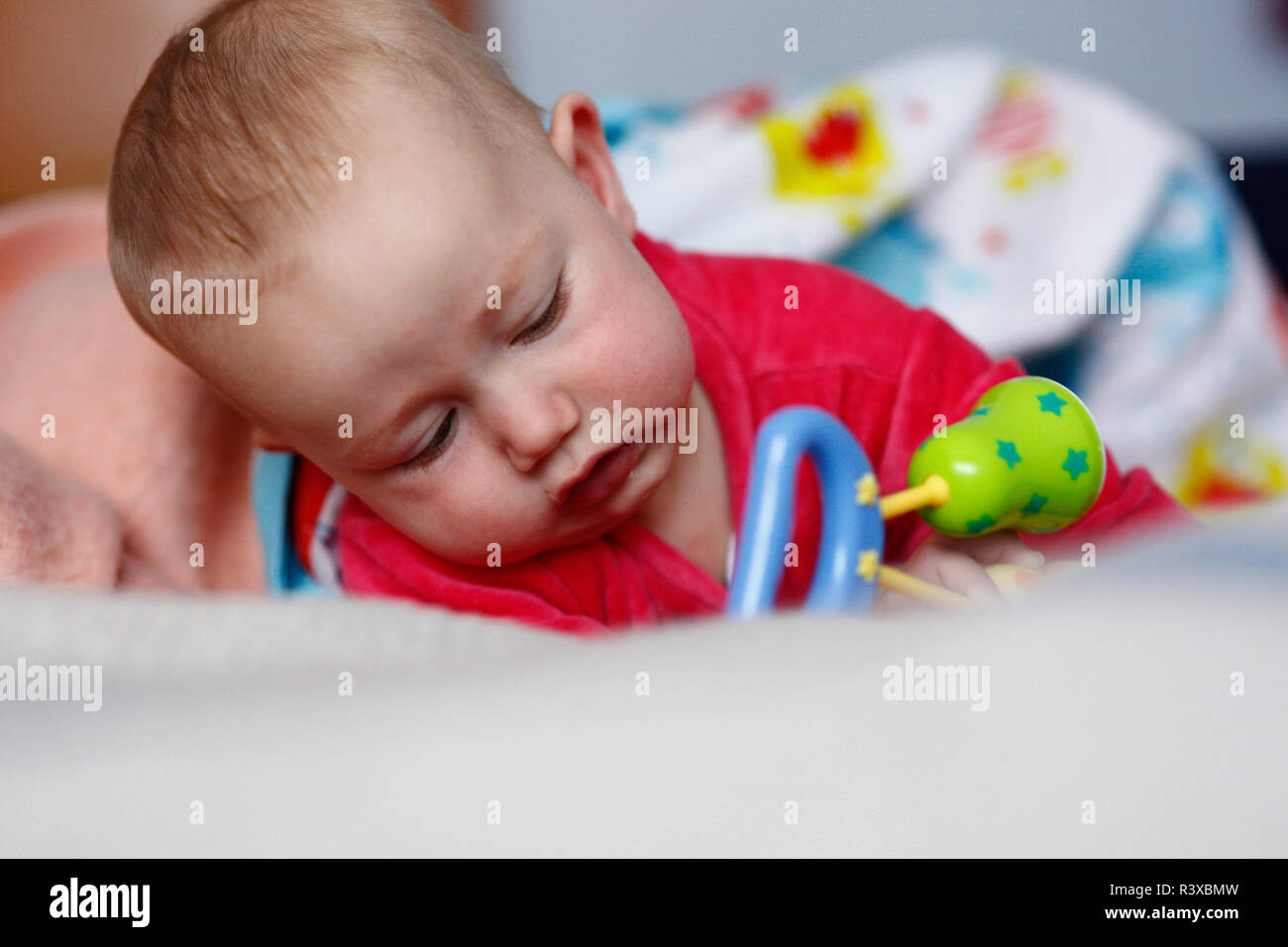 Infant Boy Biting Toy High Resolution Stock Photography and Images - Alamy