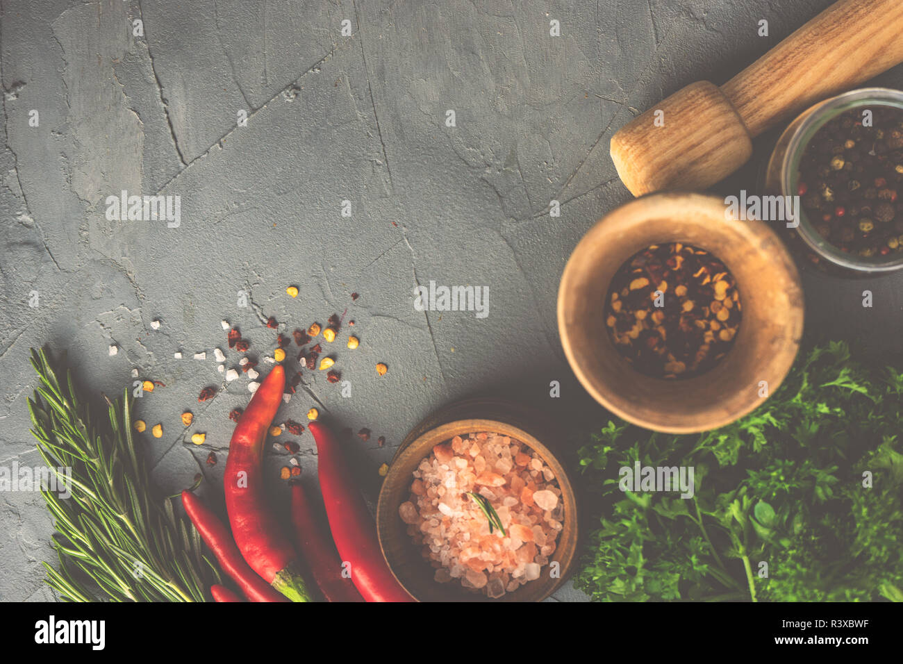 Organic spices and herbs on rustic background with copy space Stock ...