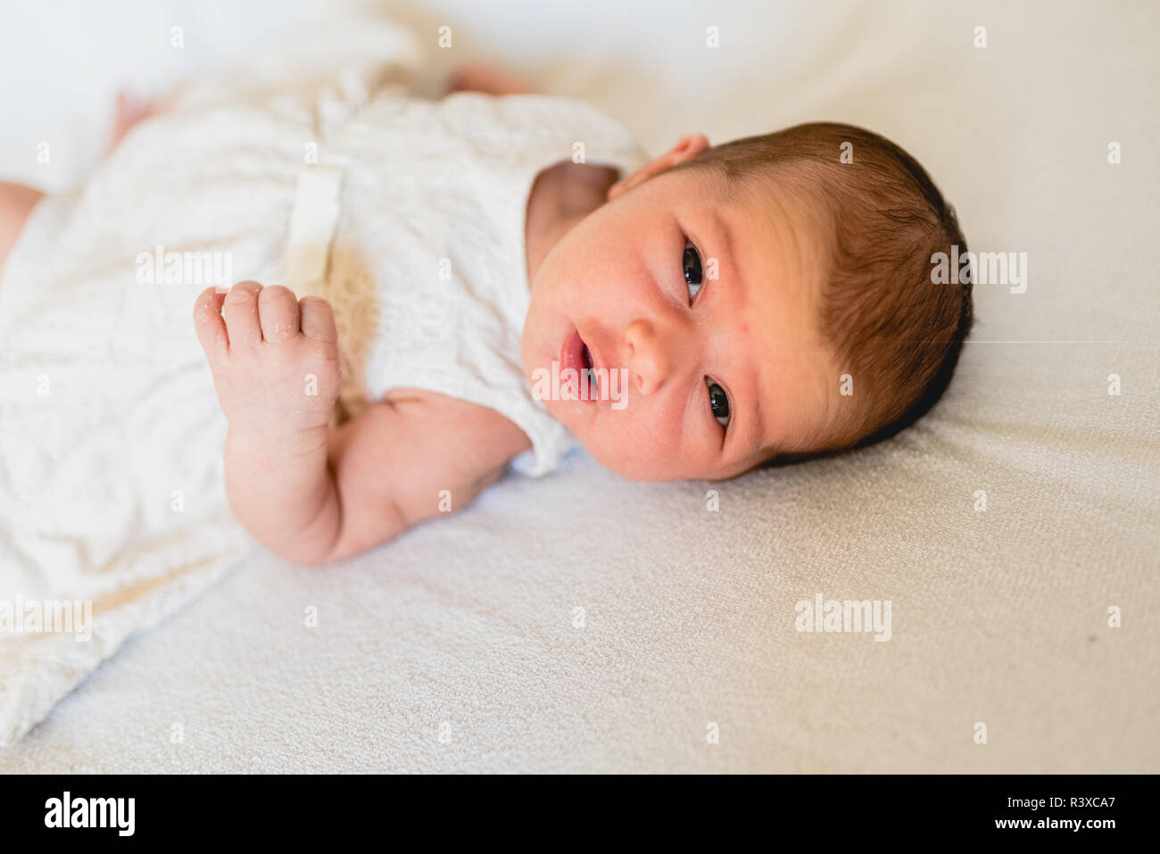 Portrait of tender and adorable 1-week-old baby Stock Photo - Alamy