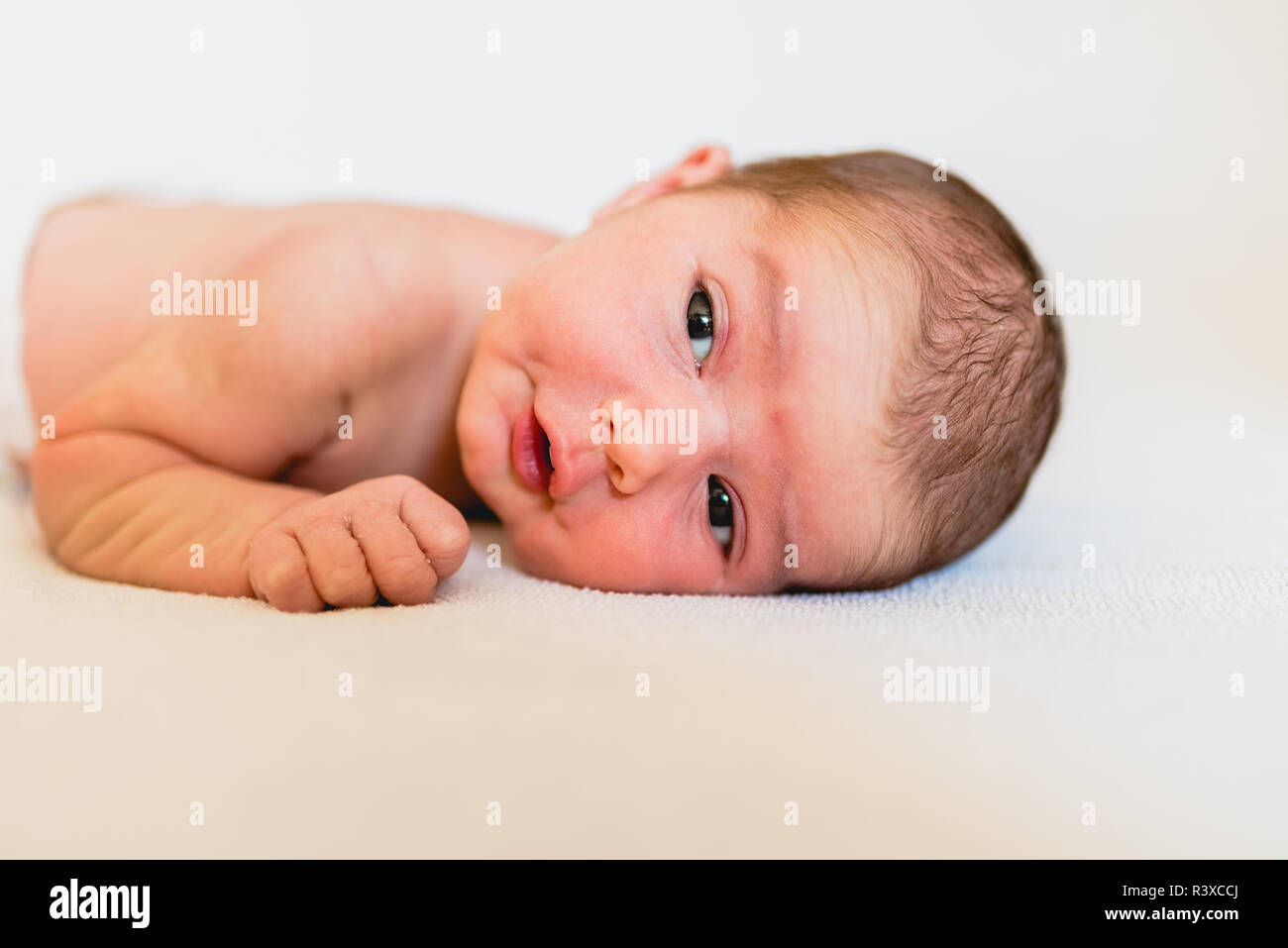 Portrait of tender and adorable 1-week-old baby Stock Photo - Alamy