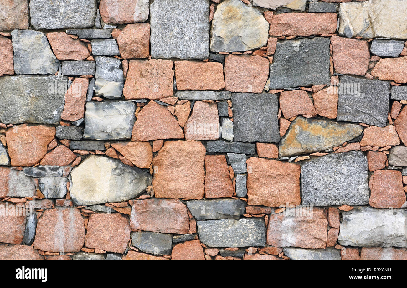 stone wall made of natural stones Stock Photo - Alamy