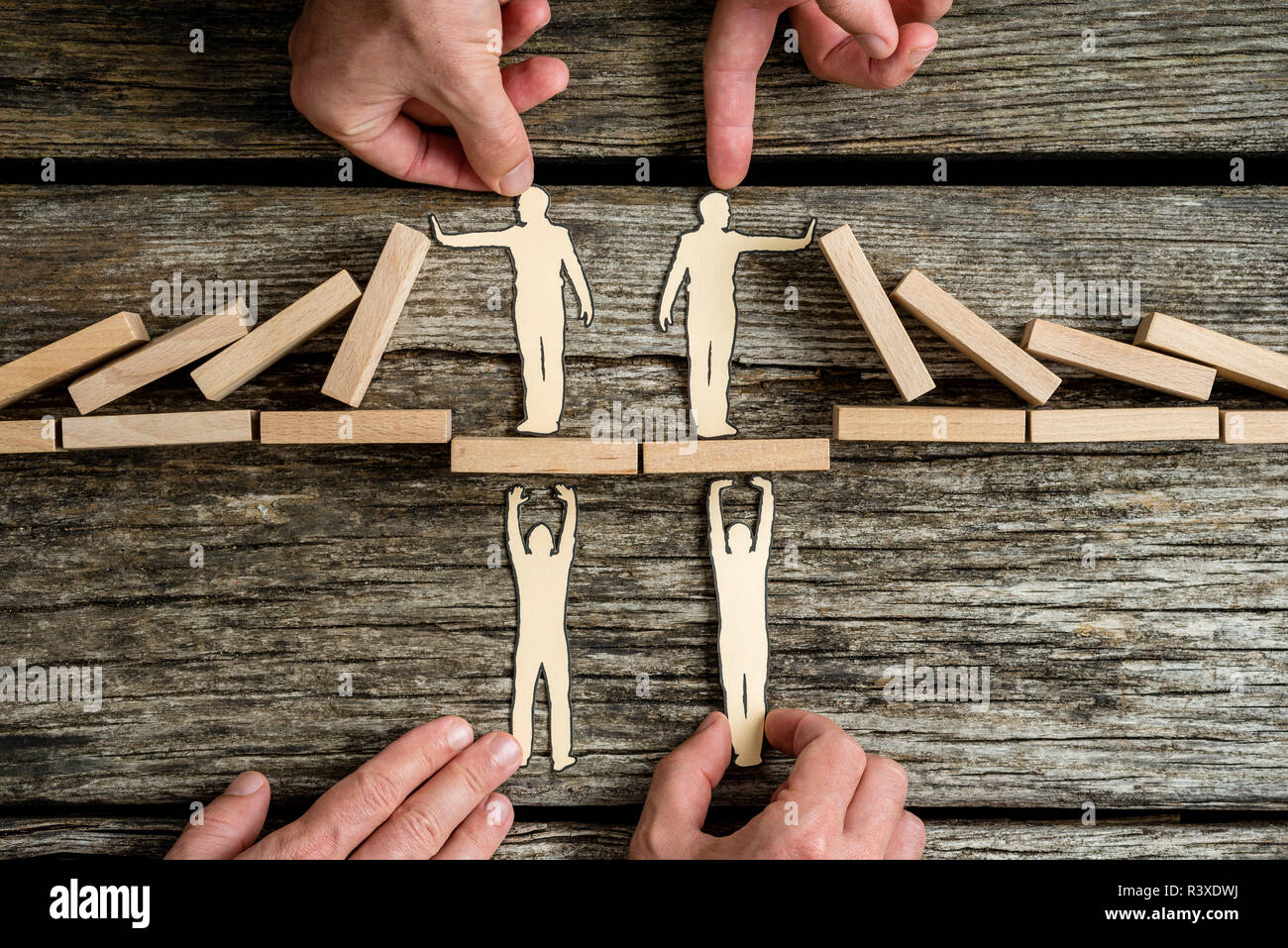 Business teamwork and cooperation concept with the hands of four ...