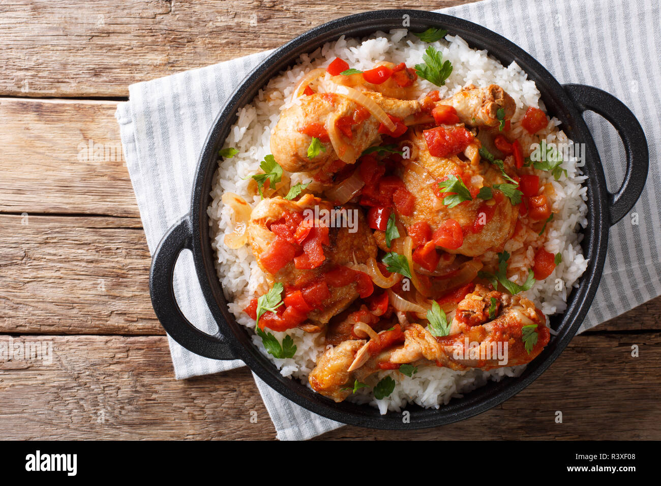 Haitian Stewed Chicken (Poule en Sauce)served with white rice in a ...