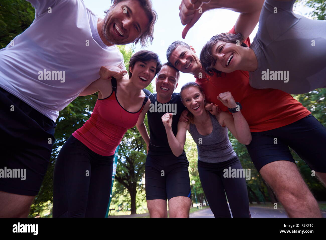 Group hug run hi-res stock photography and images - Alamy
