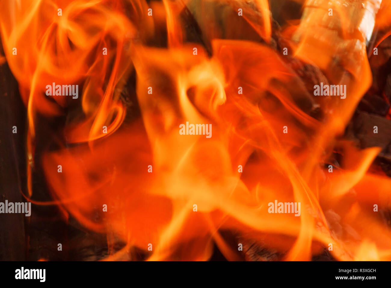the black coals are hot red flame Stock Photo - Alamy