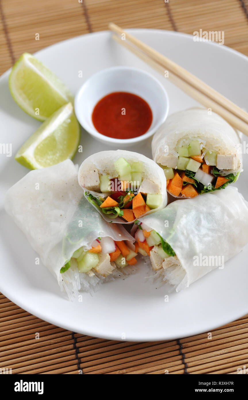 Woman eating vietnamese spring rolls hi-res stock photography and ...
