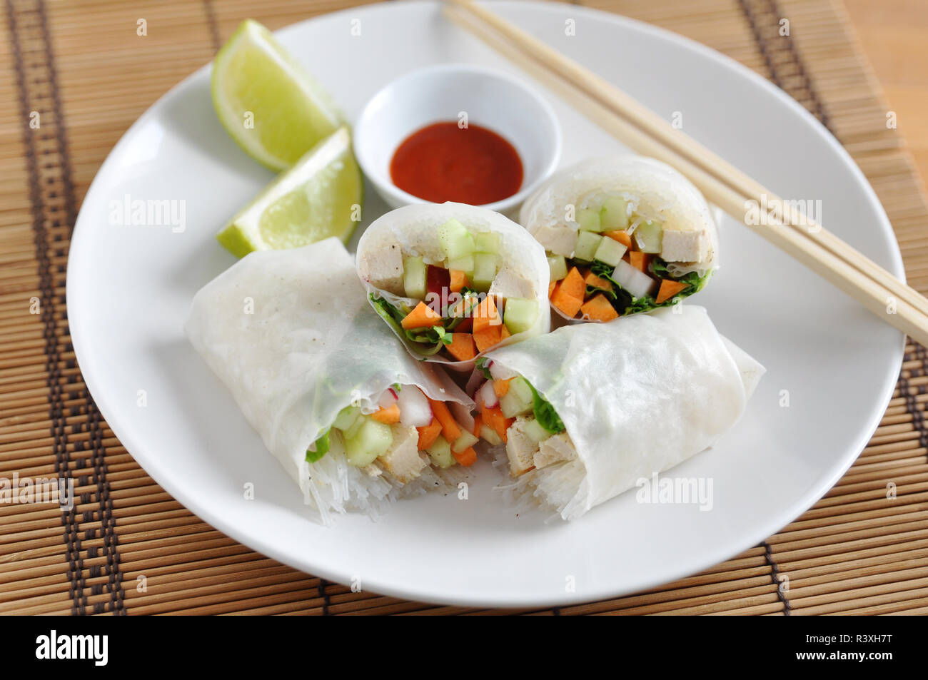 Woman eating vietnamese spring rolls hi-res stock photography and ...