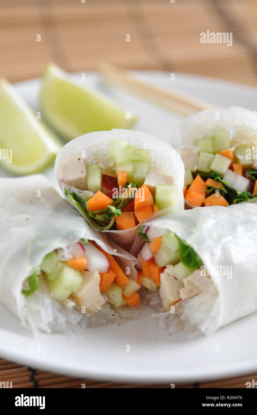 Woman eating vietnamese spring rolls hi-res stock photography and ...