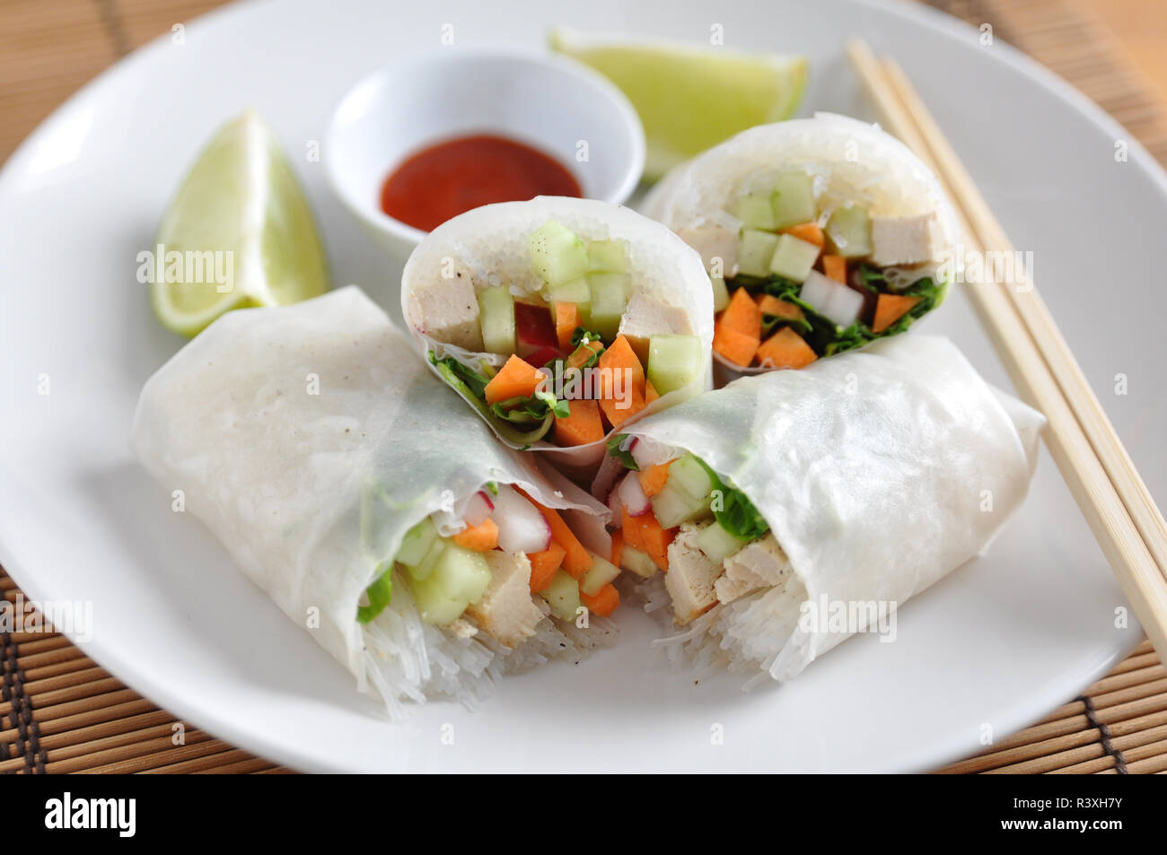 Woman eating vietnamese spring rolls hi-res stock photography and ...