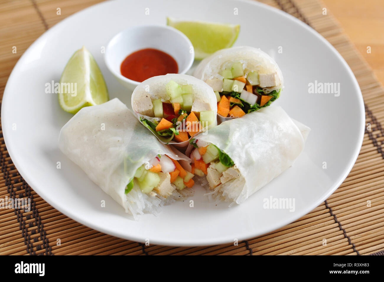 Woman eating vietnamese spring rolls hi-res stock photography and ...