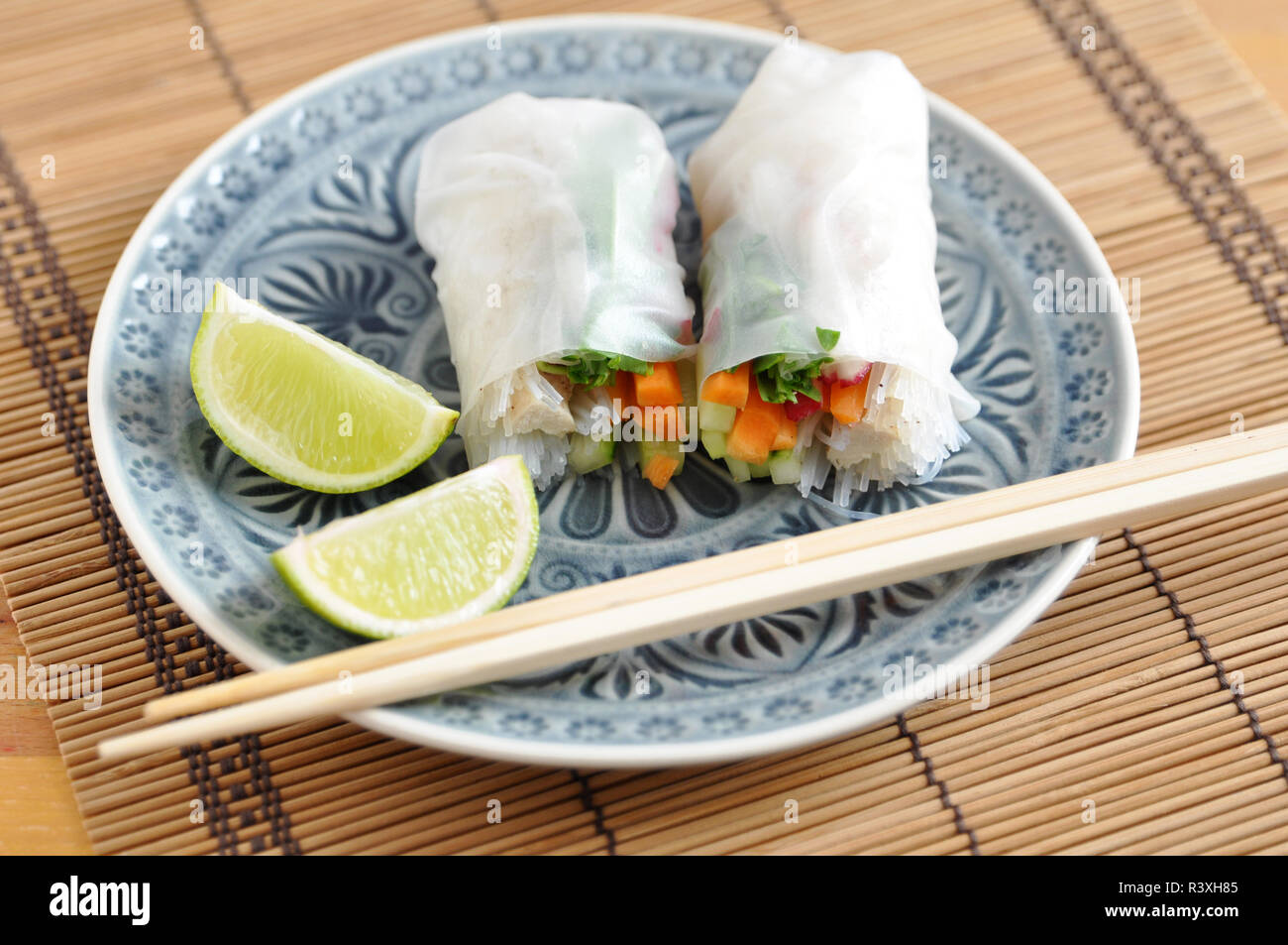 Woman eating vietnamese spring rolls hi-res stock photography and ...