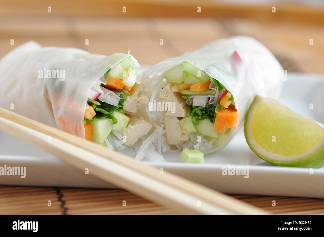 Woman eating vietnamese spring rolls hi-res stock photography and ...