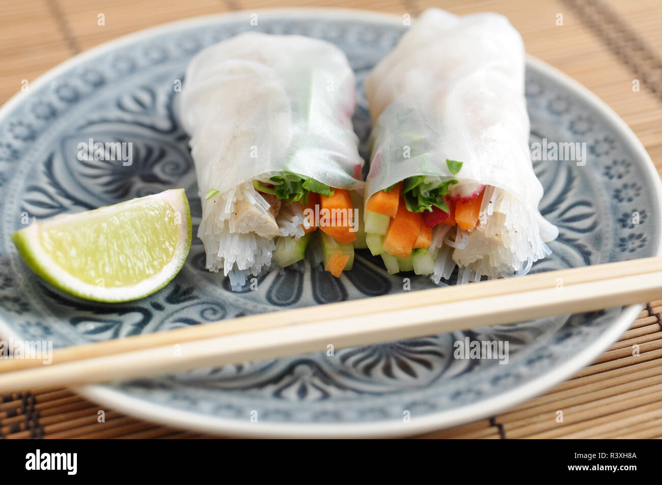 Woman eating vietnamese spring rolls hi-res stock photography and ...