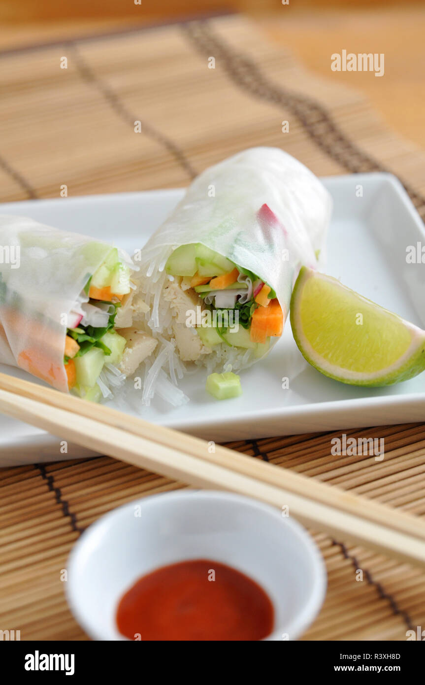 Woman eating vietnamese spring rolls hi-res stock photography and ...