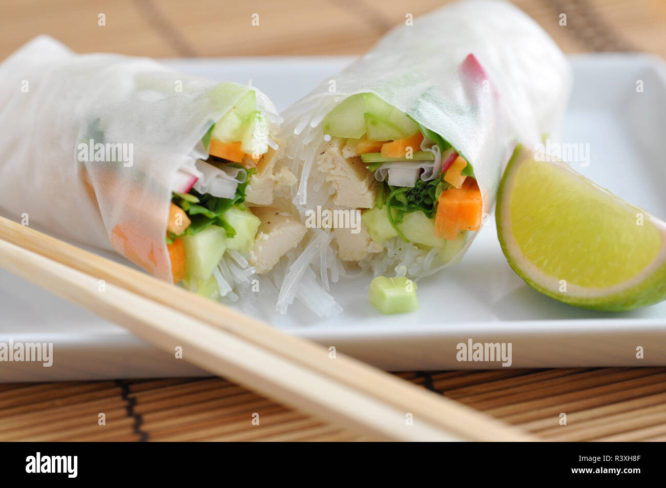 Woman eating vietnamese spring rolls hi-res stock photography and ...